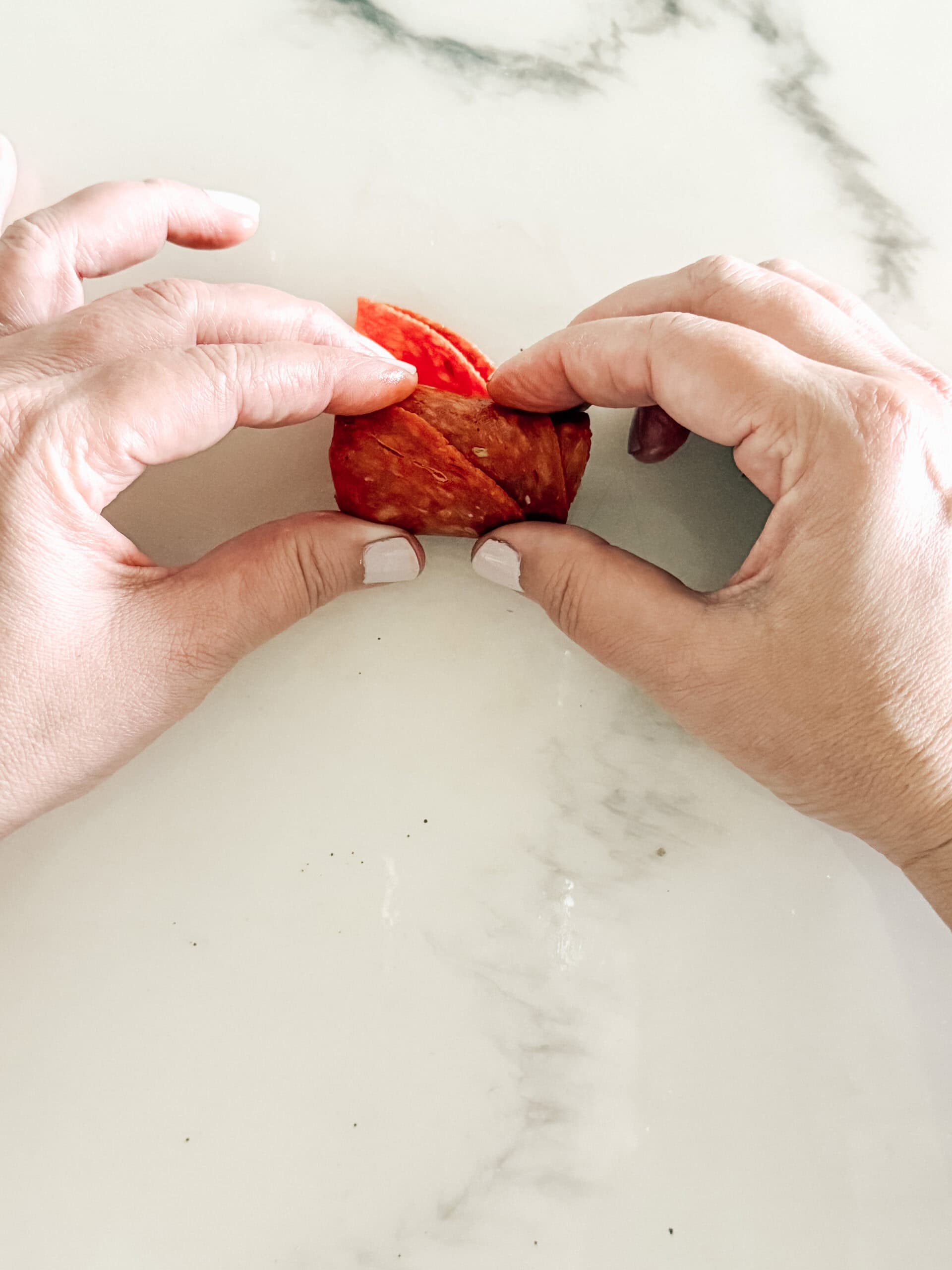 Elevate Your Appetizer Game with Stunning Pepperoni Rose Skewers!