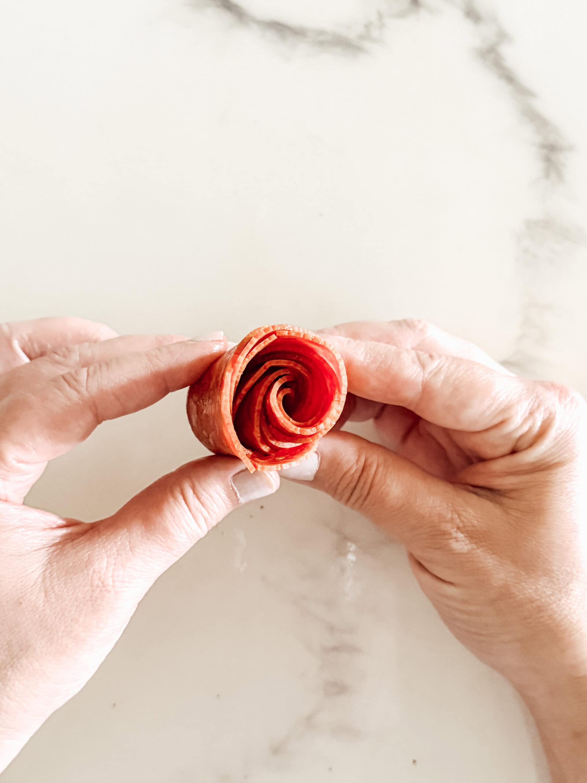 Elevate Your Appetizer Game with Stunning Pepperoni Rose Skewers!