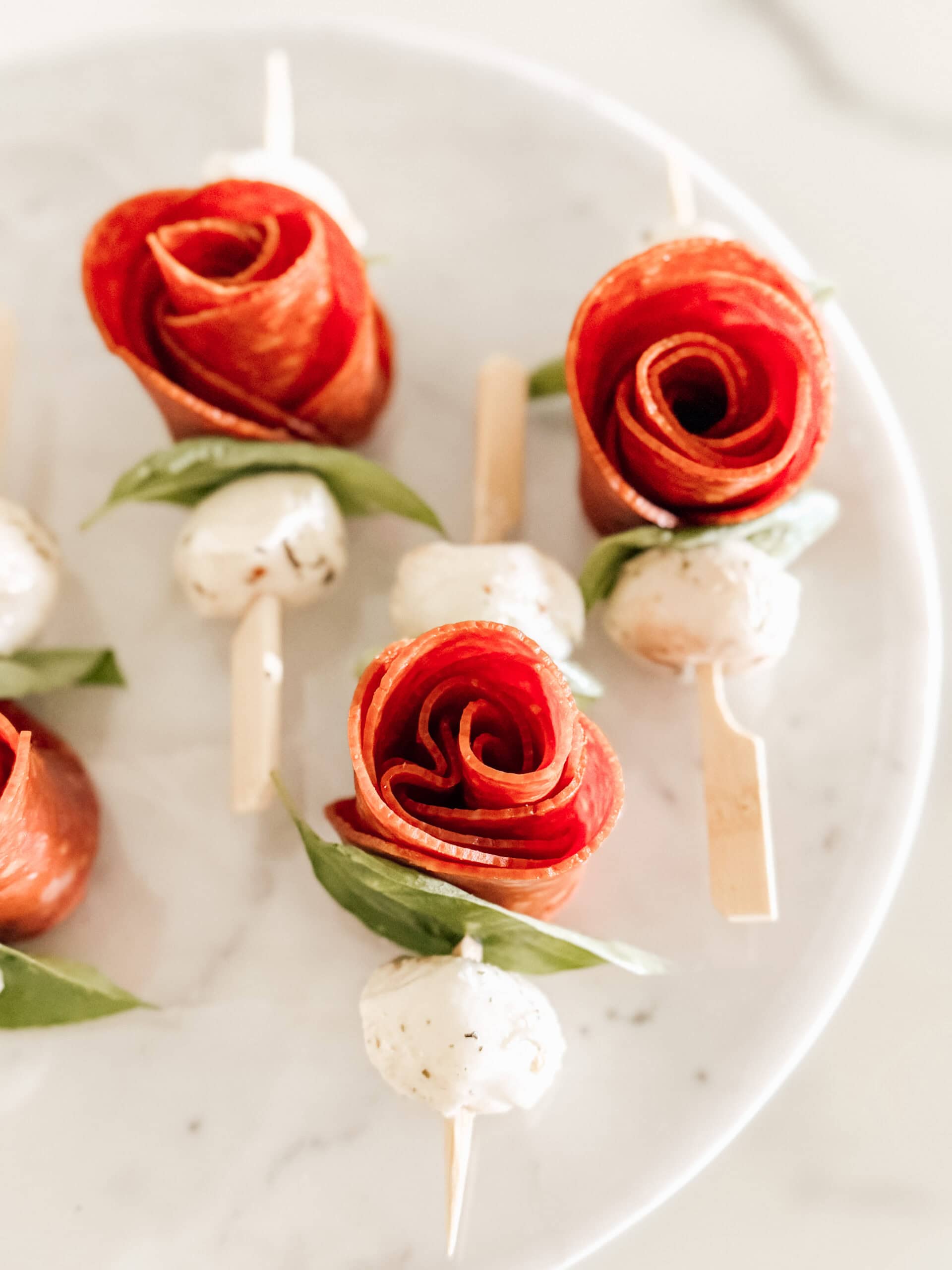 Elevate Your Appetizer Game with Stunning Pepperoni Rose Skewers!